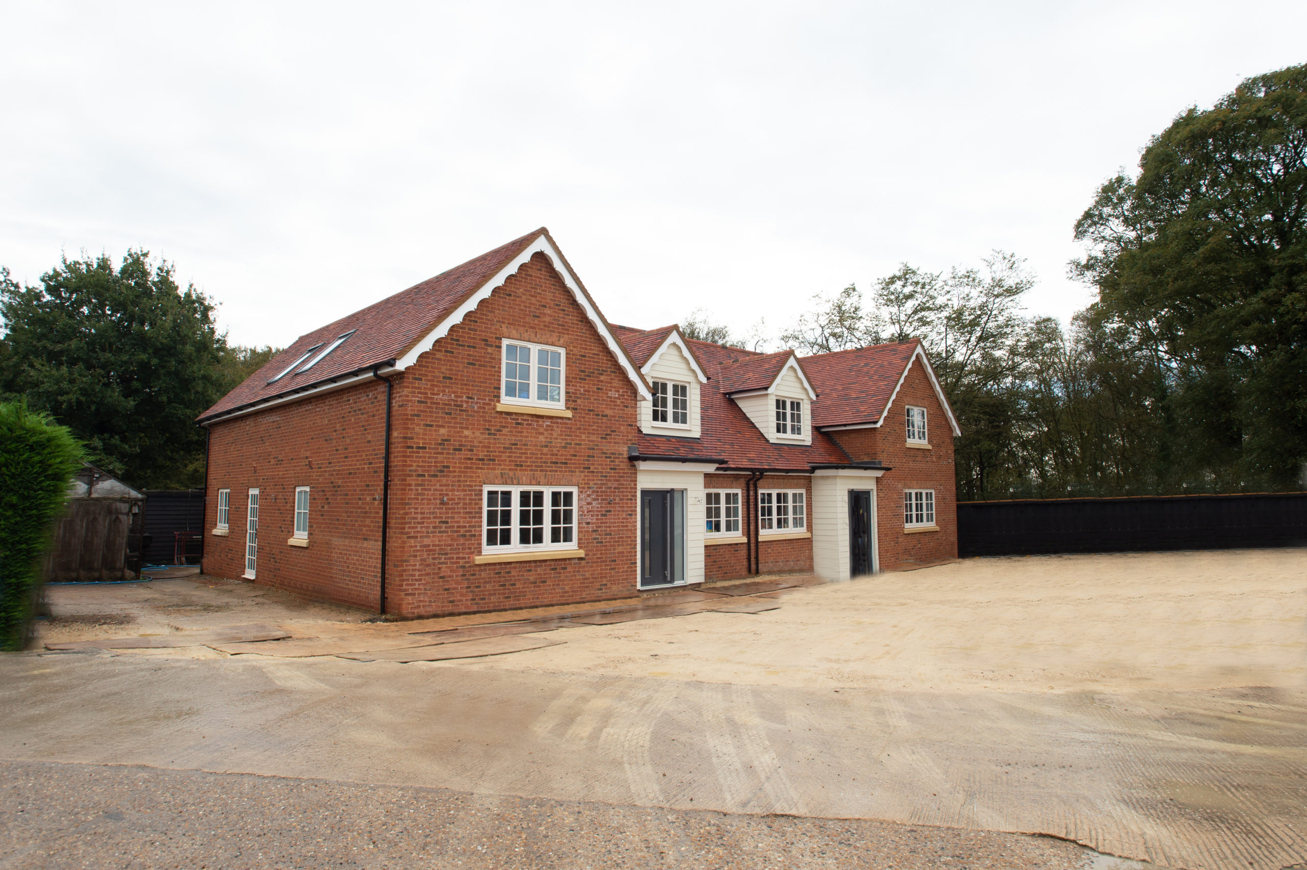 Two luxury new build houses on an old farmhouse site in Cheshunt